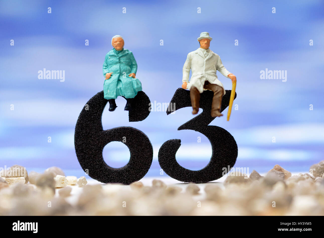 Senior citizen's pair on the number 63, symbolic photo pension at the ...