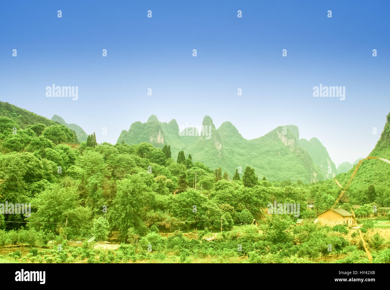 View on green karst landscape by Yangshuo in China Stock Photo - Alamy