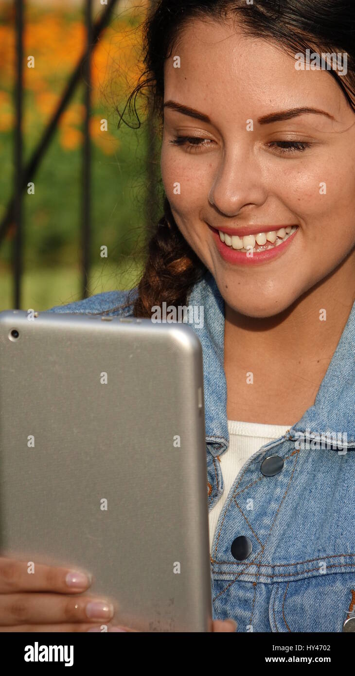 Girl Using Tablet Stock Photo - Alamy