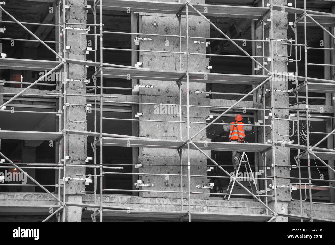 Low angle view of rows and columns of metal scaffolding over ...