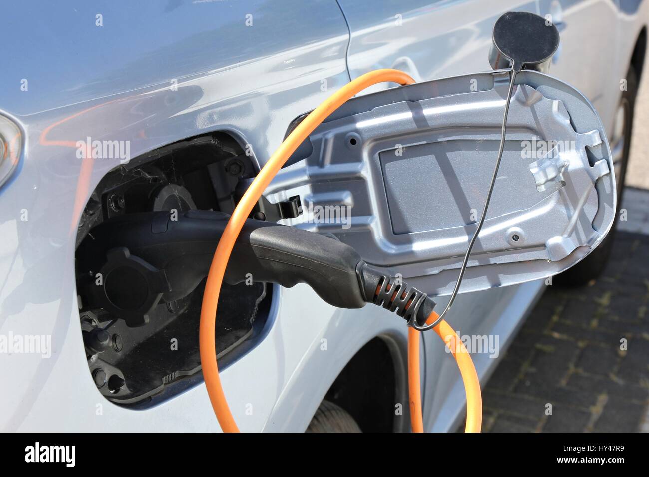 electric car being charged Stock Photo - Alamy