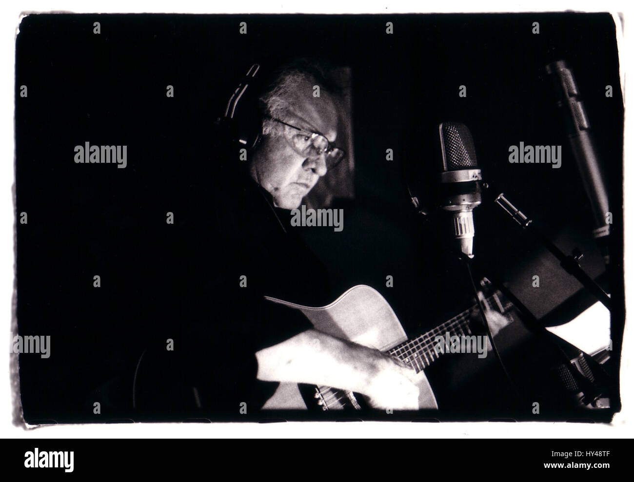 Johnny Cash in the recording studio laying tracks for the album ...