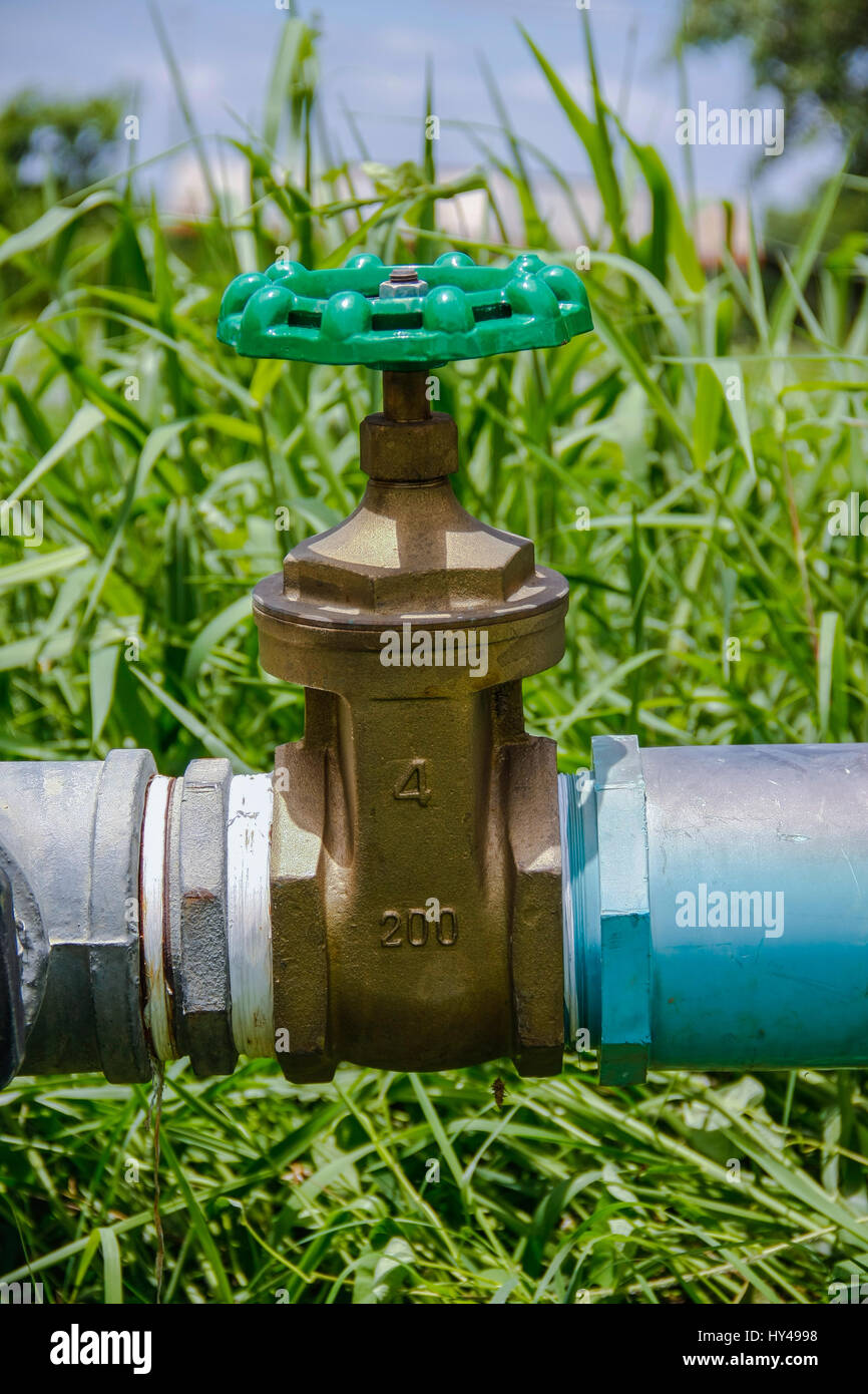 green water valve and brass joint of metal pipeline with Plumbing PVC ...