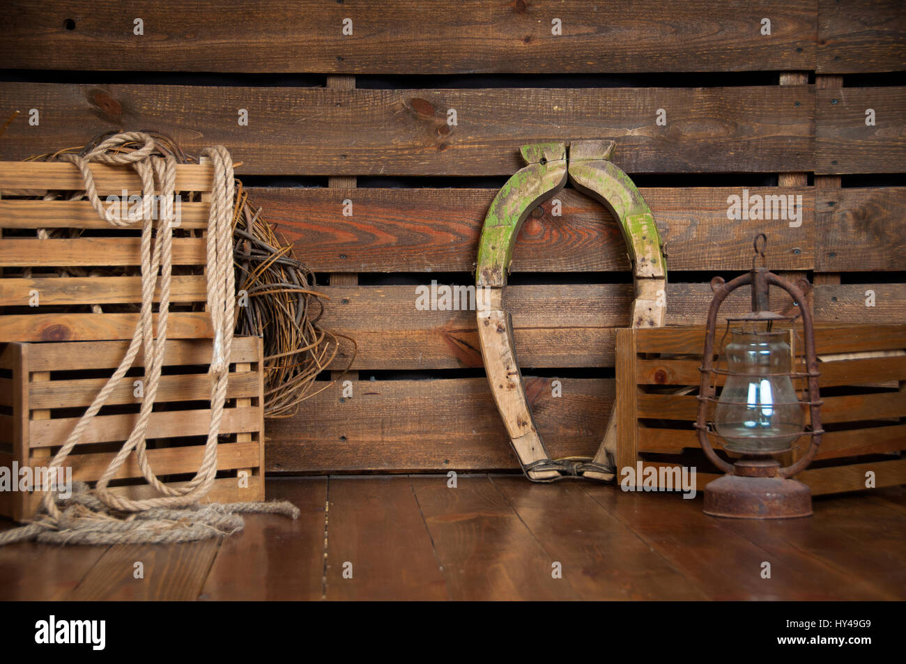 Still in cowboy style on wooden boards Stock Photo - Alamy