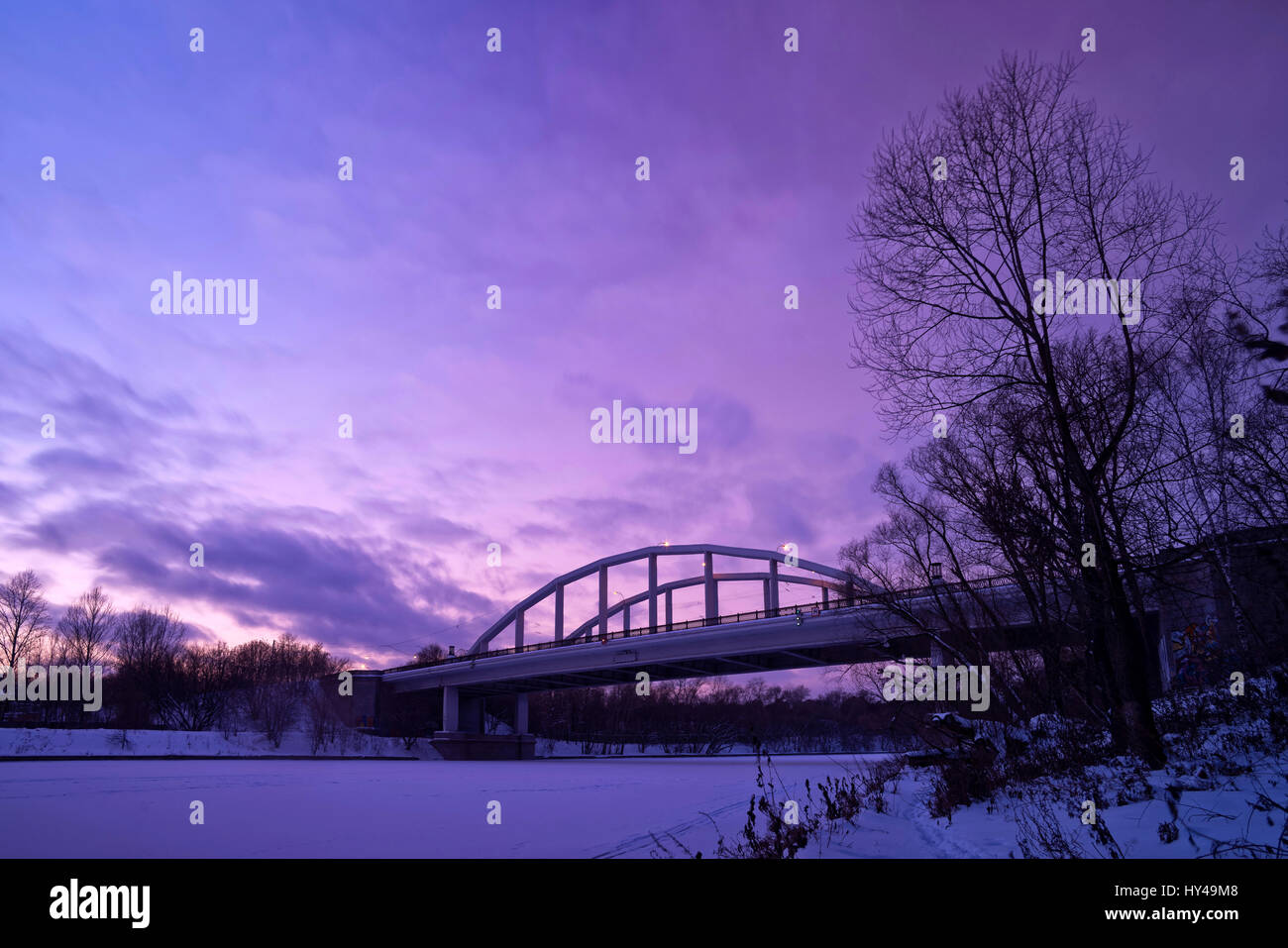 Winter landscape with a bridge Stock Photo - Alamy