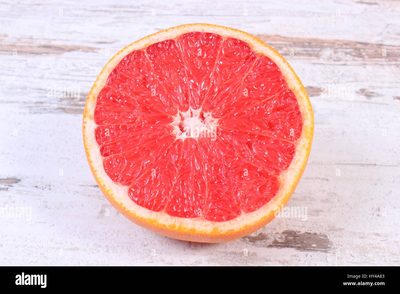 Fresh ripe grapefruit on old white wooden background, healthy ...