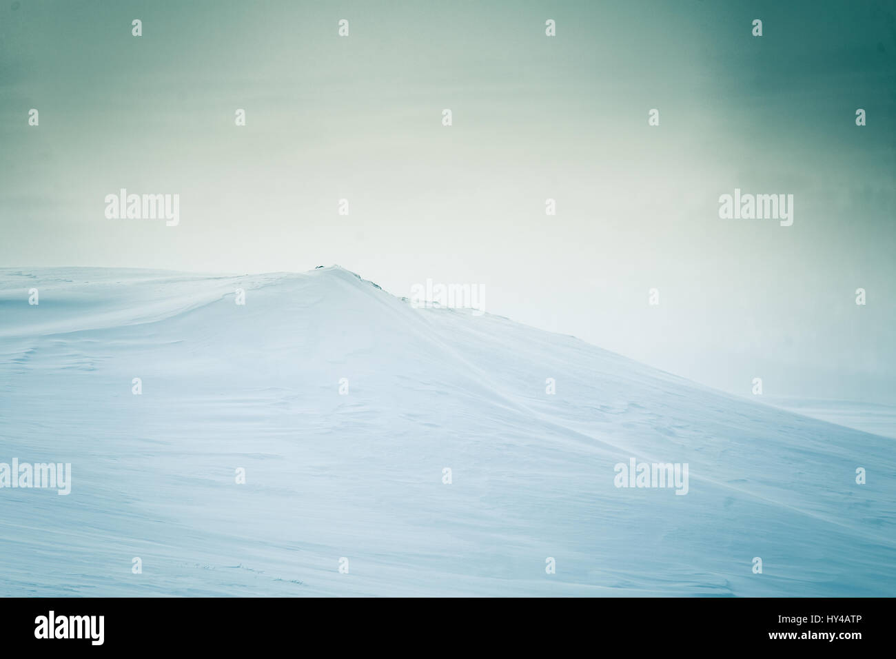 A beautiful, artistic, minimalist landscape with a lot of snow in the ...