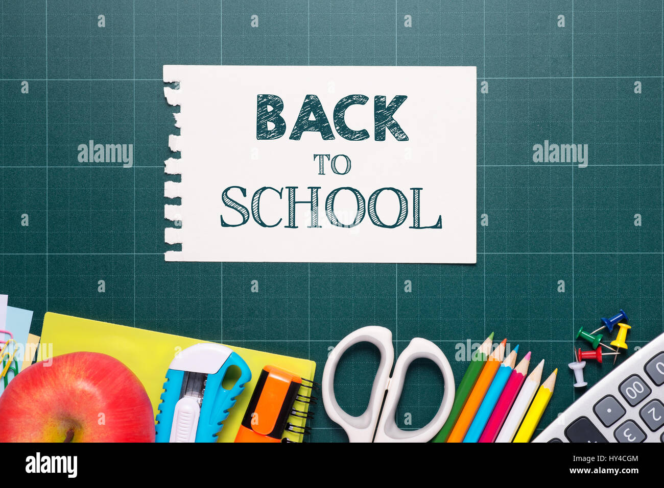 Back to school supplies. Books and chalkboard Stock Photo - Alamy