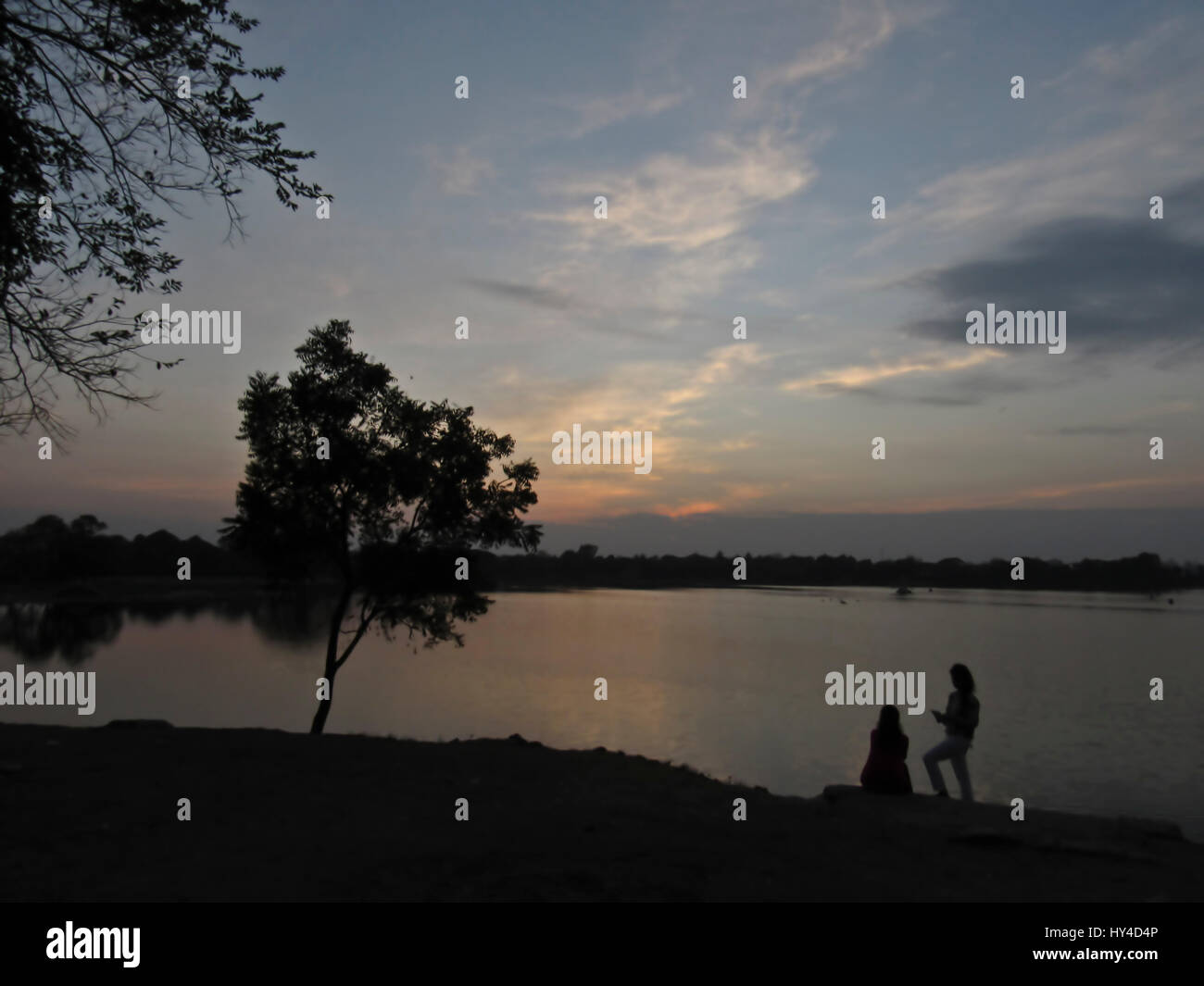 natural scene of a lake at sunset Stock Photo - Alamy