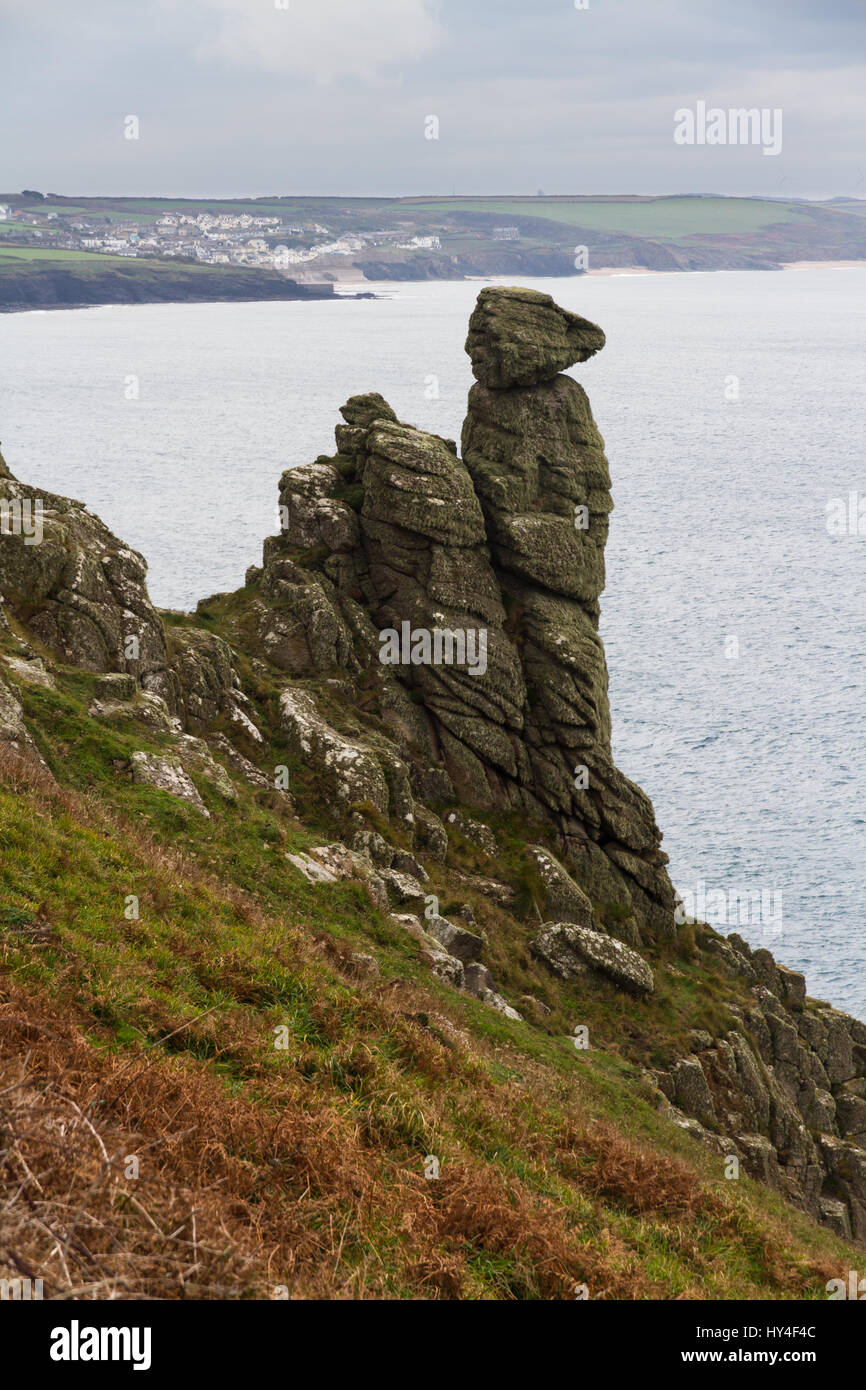 Rock stack on cliffs called The Bishop or The Camel. Rinsey, Cornwall ...