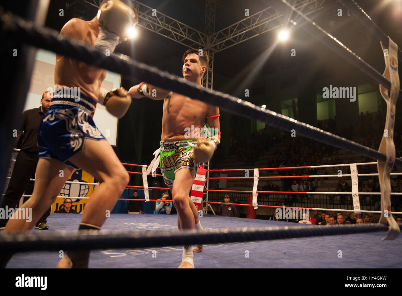 male versus male kickboxing match Stock Photo - Alamy
