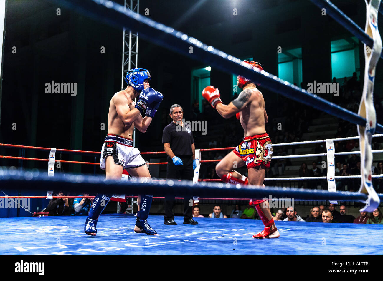 male versus male kickboxing match Stock Photo - Alamy