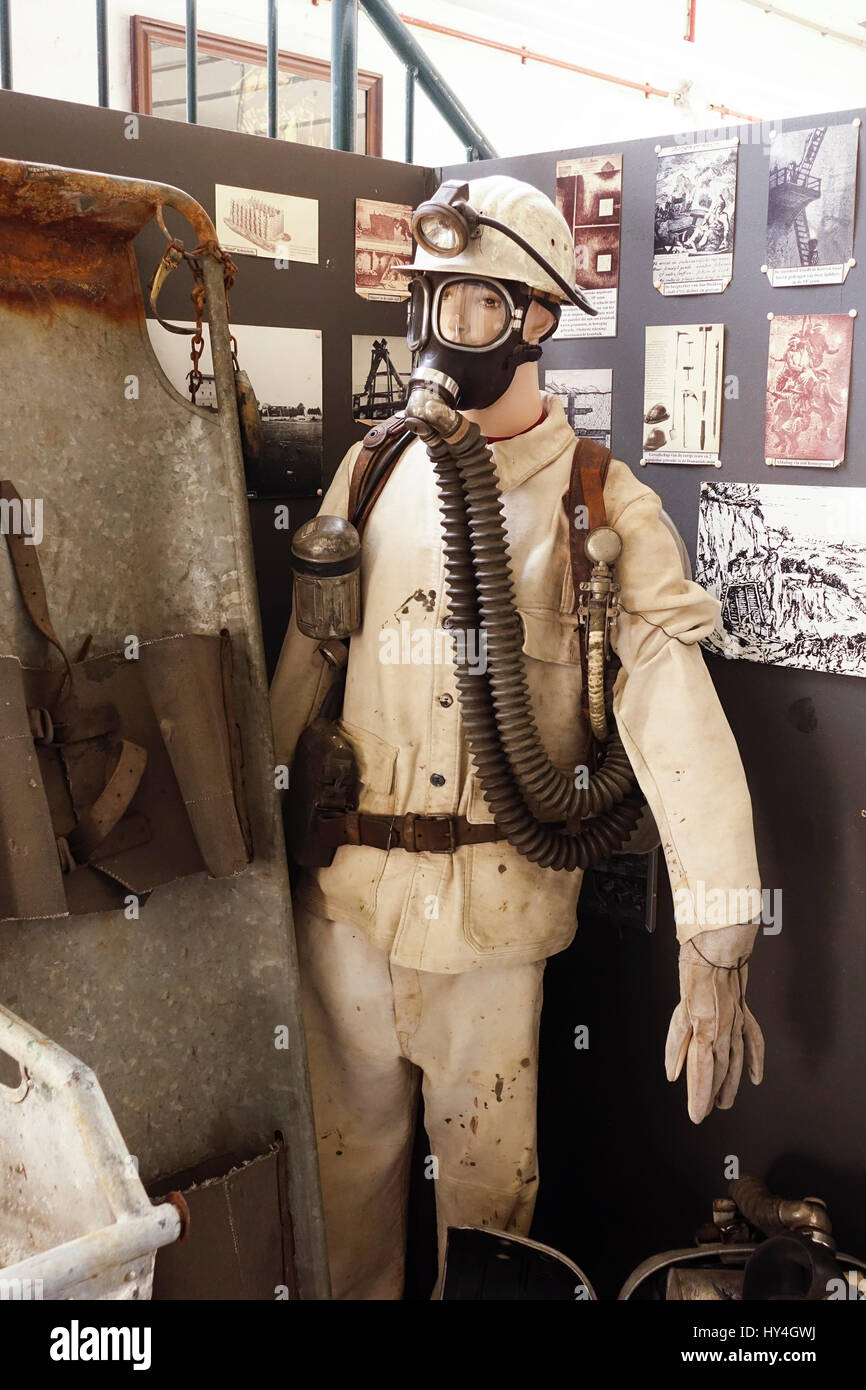 Miners' outfit with mask and helmet, safety suit on display at Coal ...