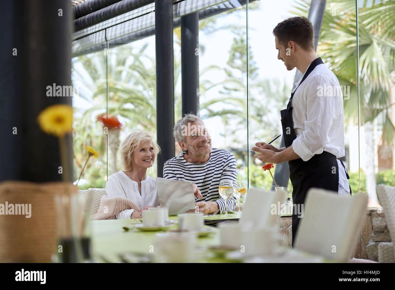 Couple attractive, cheerful, Best Ager, cafÃ©, restaurant, order at the ...