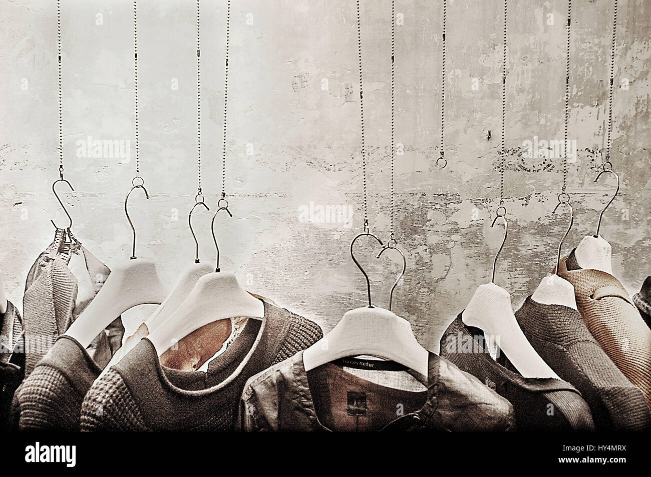 Hangers with chains Stock Photo - Alamy