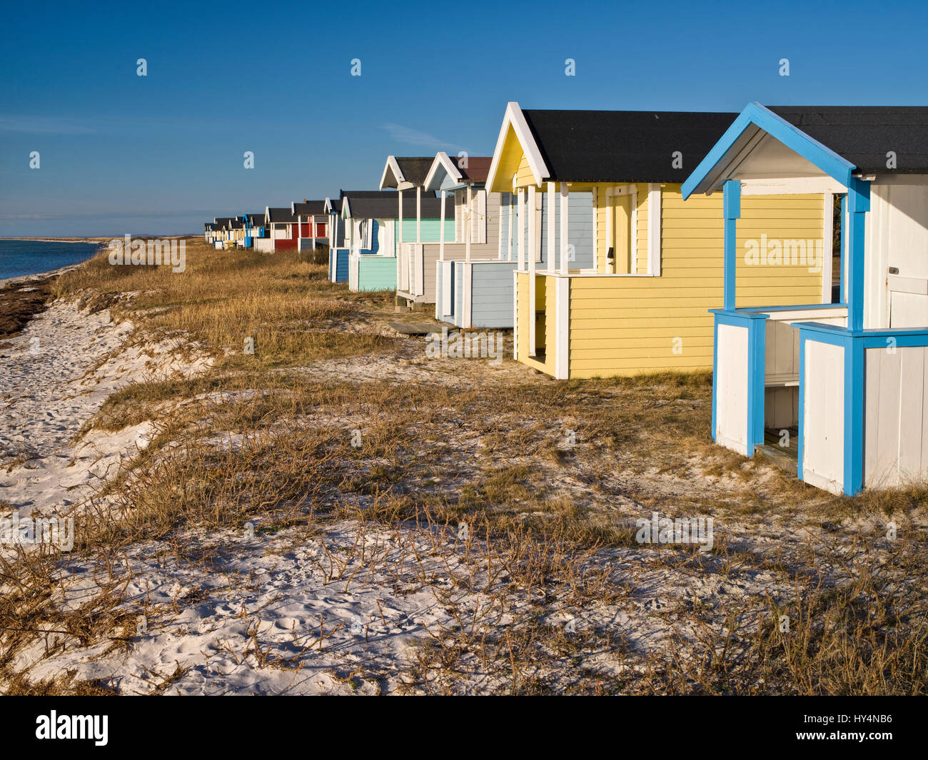 Sweden, Skane, Falsterbo, colorful bathing hut at the Baltic Sea beach ...