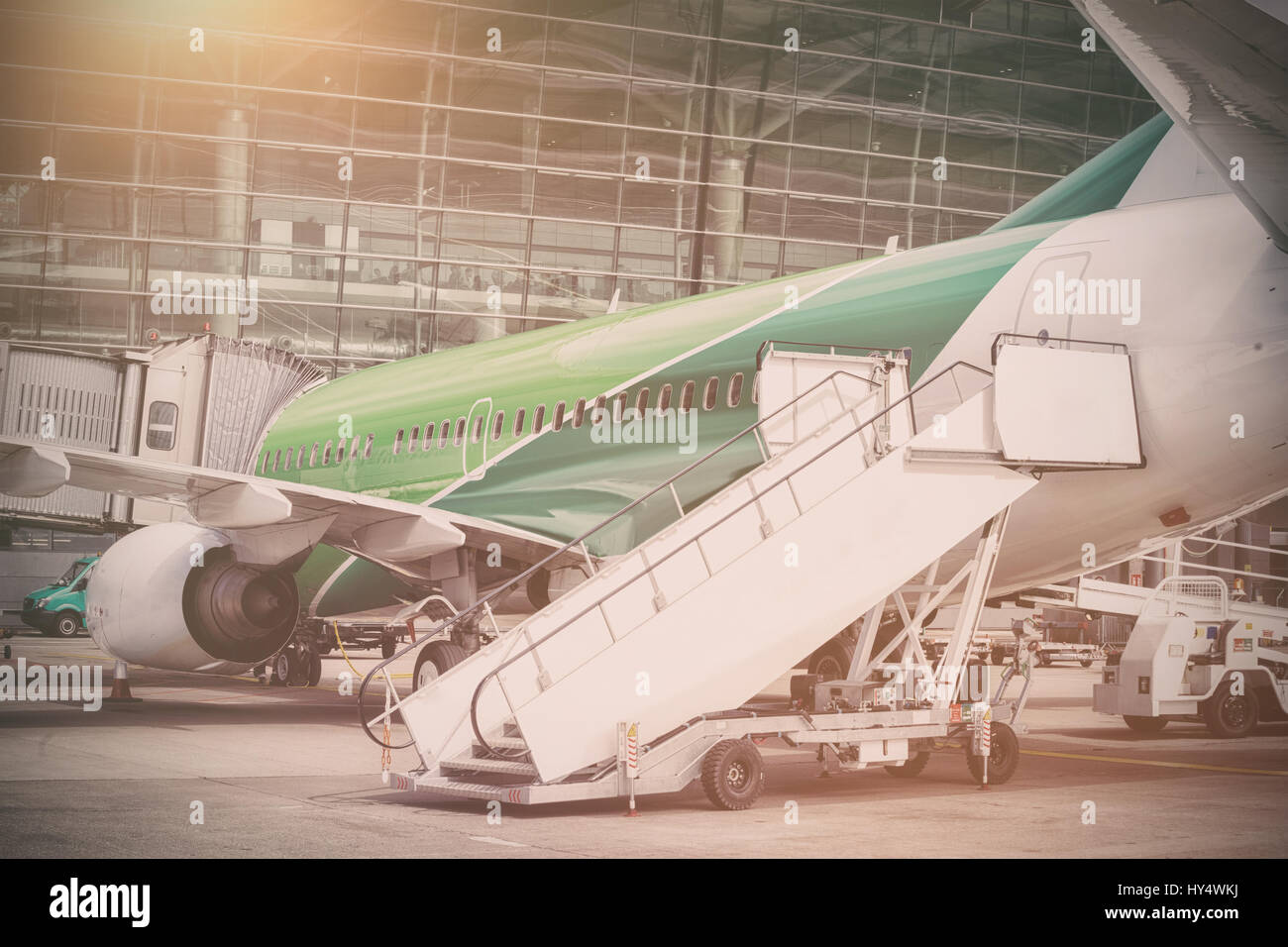 Airplane parked at runway Stock Photo - Alamy