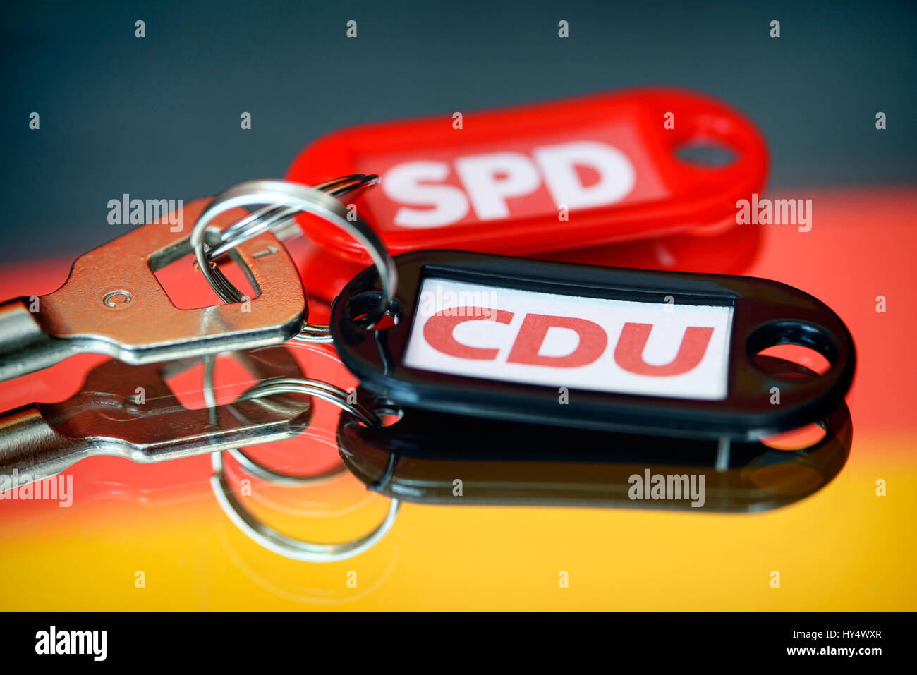 Key with key chain of CDU and SPD, symbolic photo grand coalition ...