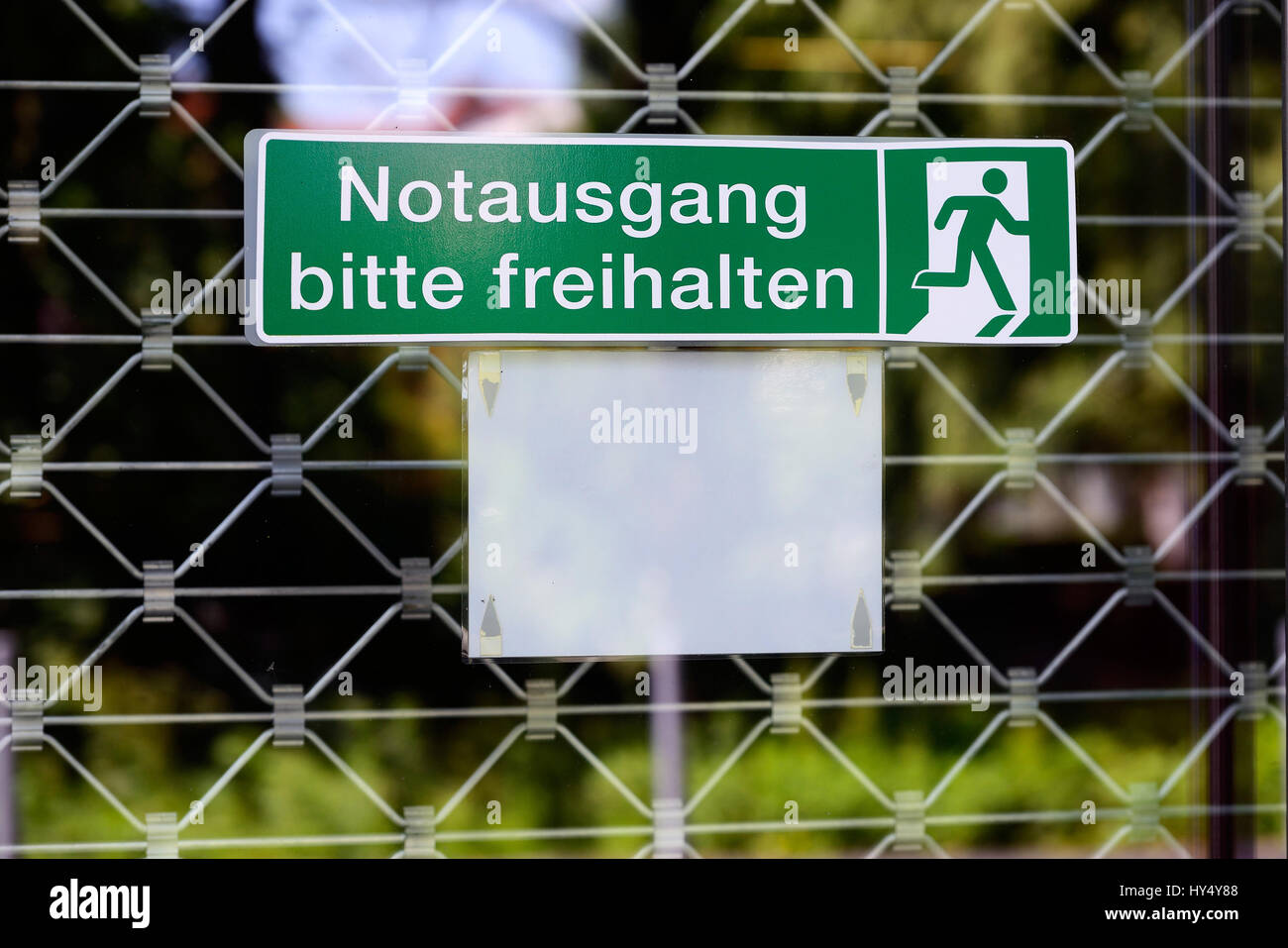 Sign Emergency exit, Schild Notausgang Stock Photo - Alamy