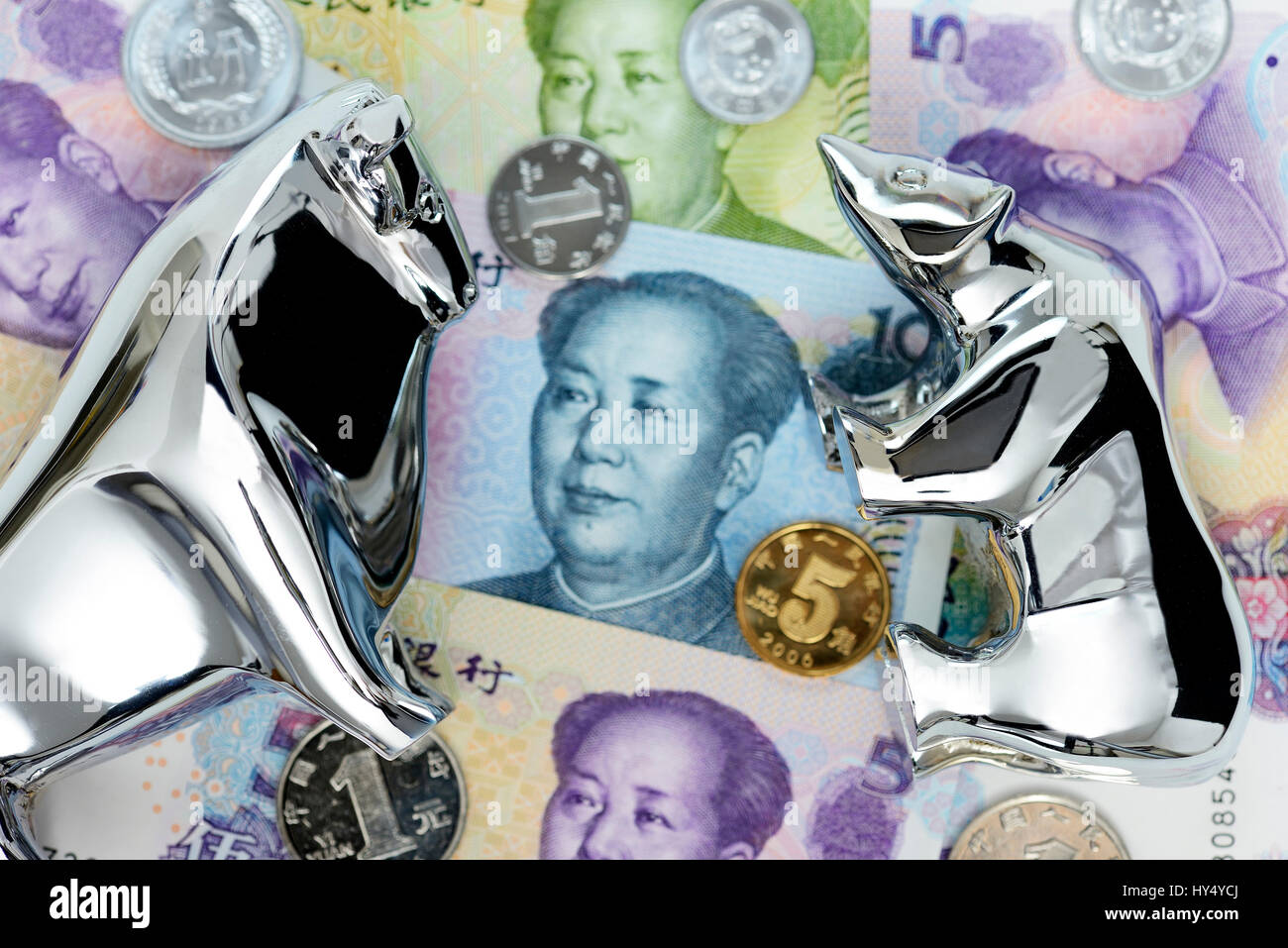 Stock market symbol bull and bear on Chinese bank notes, stock market ...