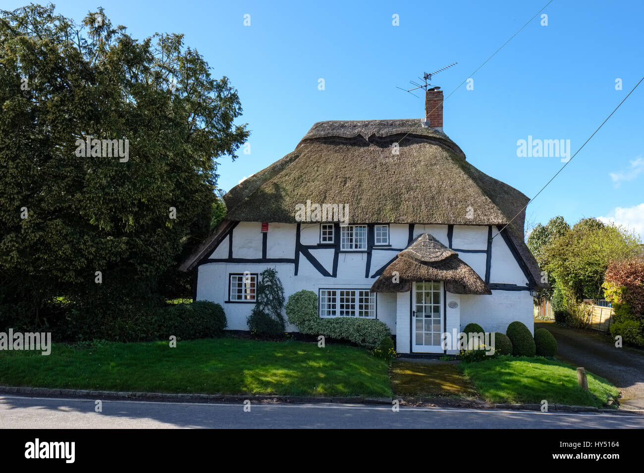 View of a Thatched cottage in Micheldever Hampshire Stock Photo - Alamy
