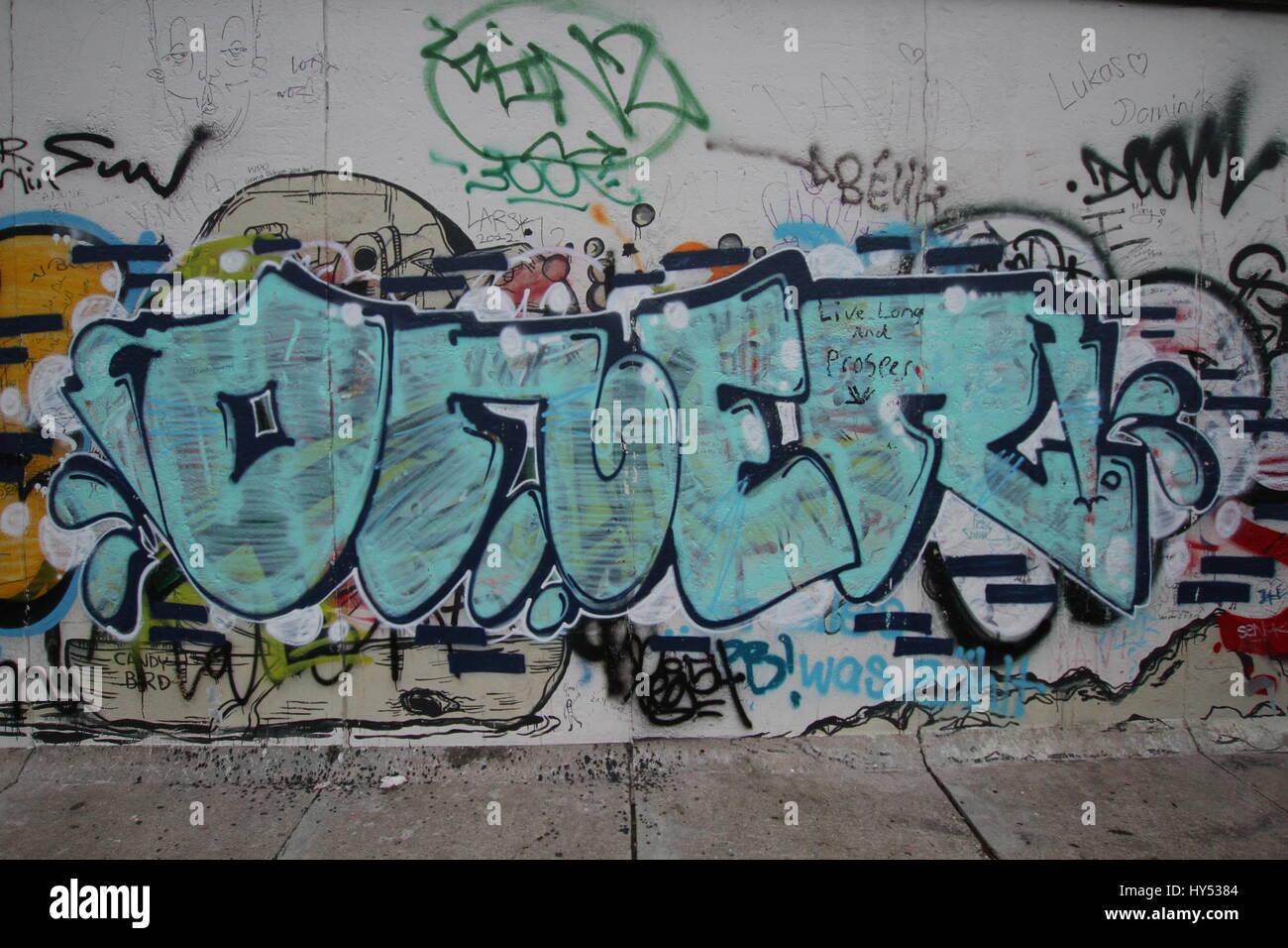 Different photos of graffiti in the historic east and west side of the ...