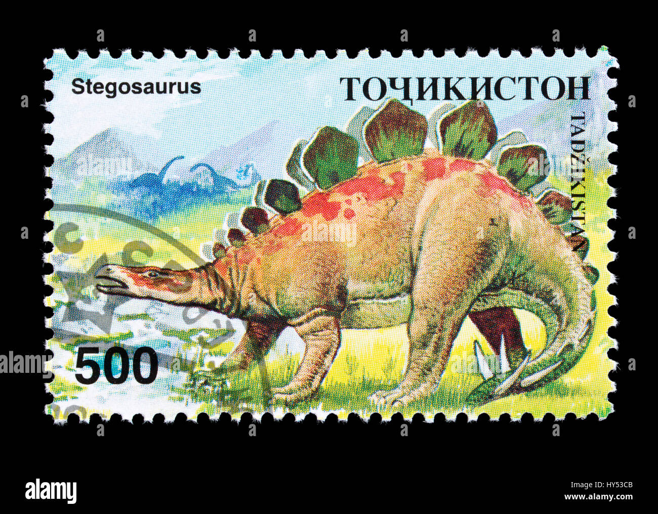 Postage stamp from Tajikistan depicting a stegosaurus dinosaur Stock ...
