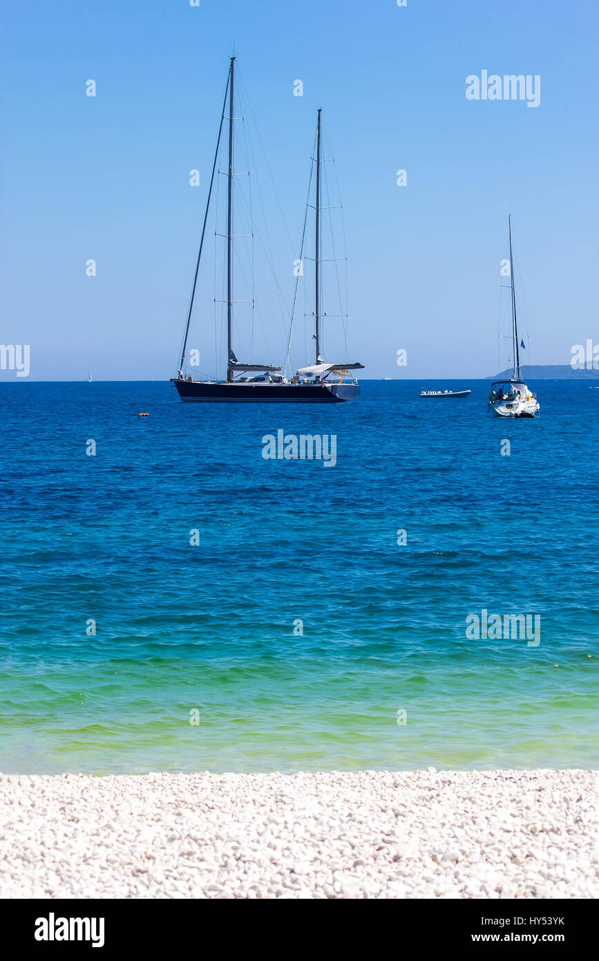 Beach, sea and boat Stock Photo - Alamy