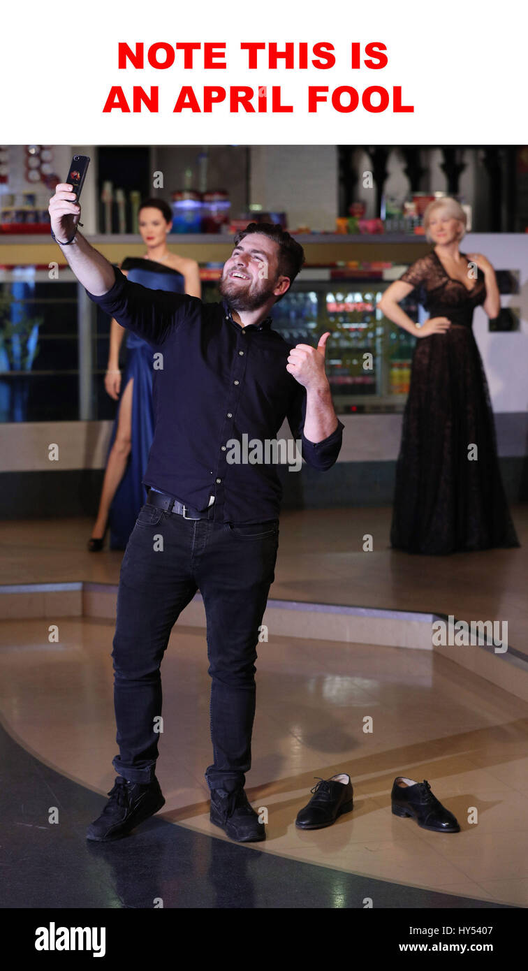 NOTE THIS IS AN APRIL FOOL A man takes a selfie with Madame Tussaud's ...