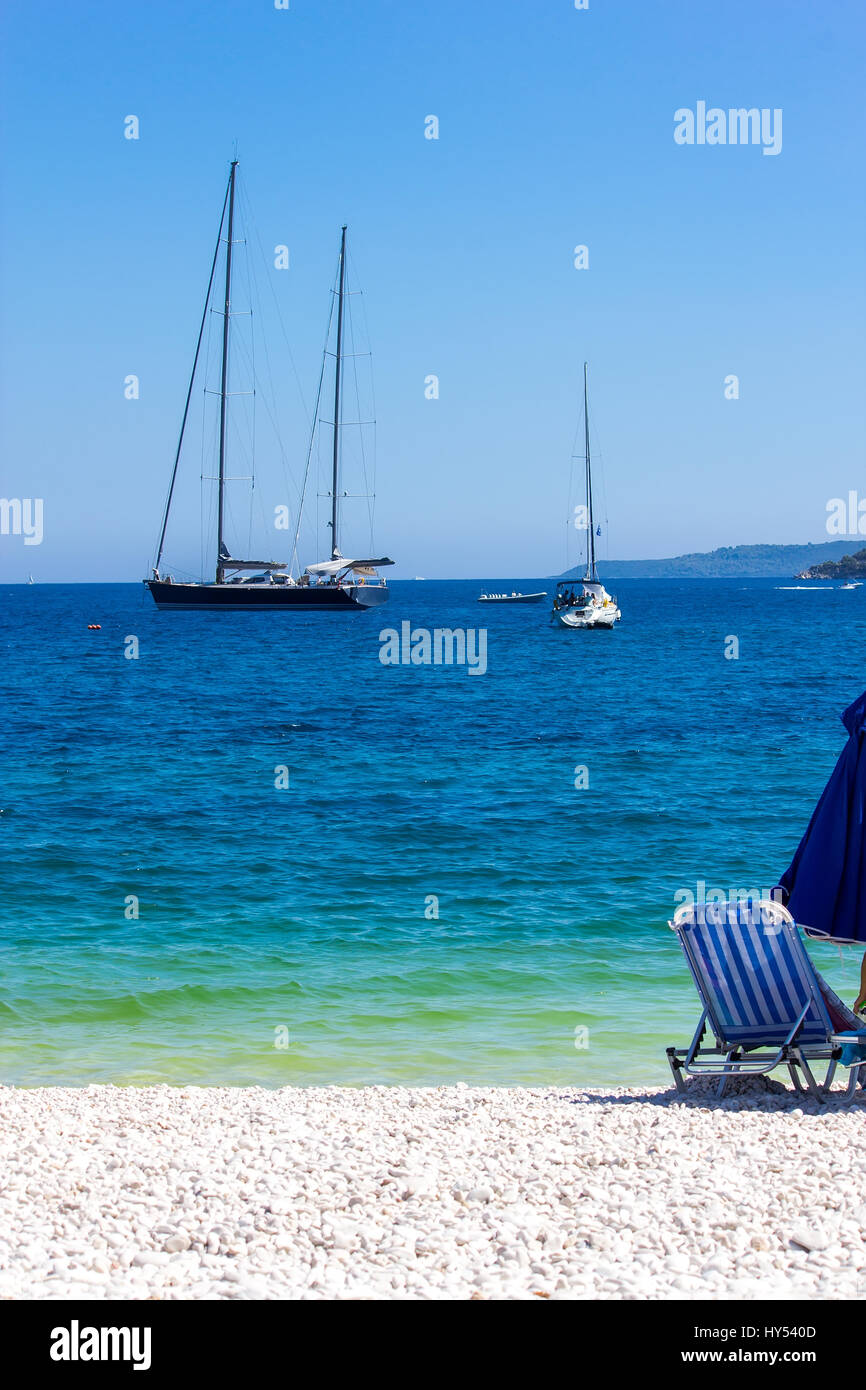 Beach, sea and boat Stock Photo - Alamy