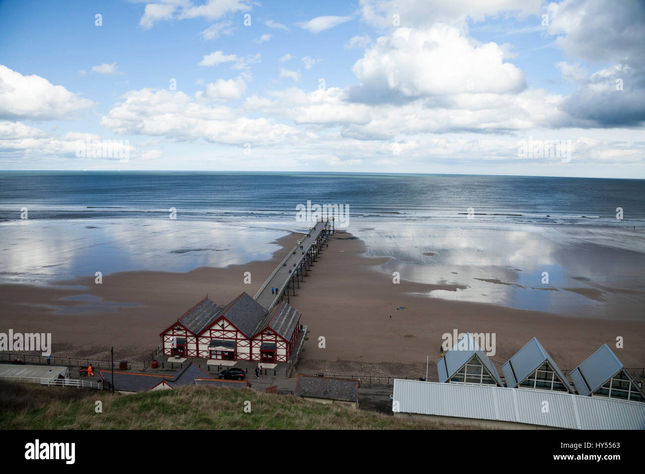 A view from the cliffs at Saltburn,England,UK, looking down at the pier ...