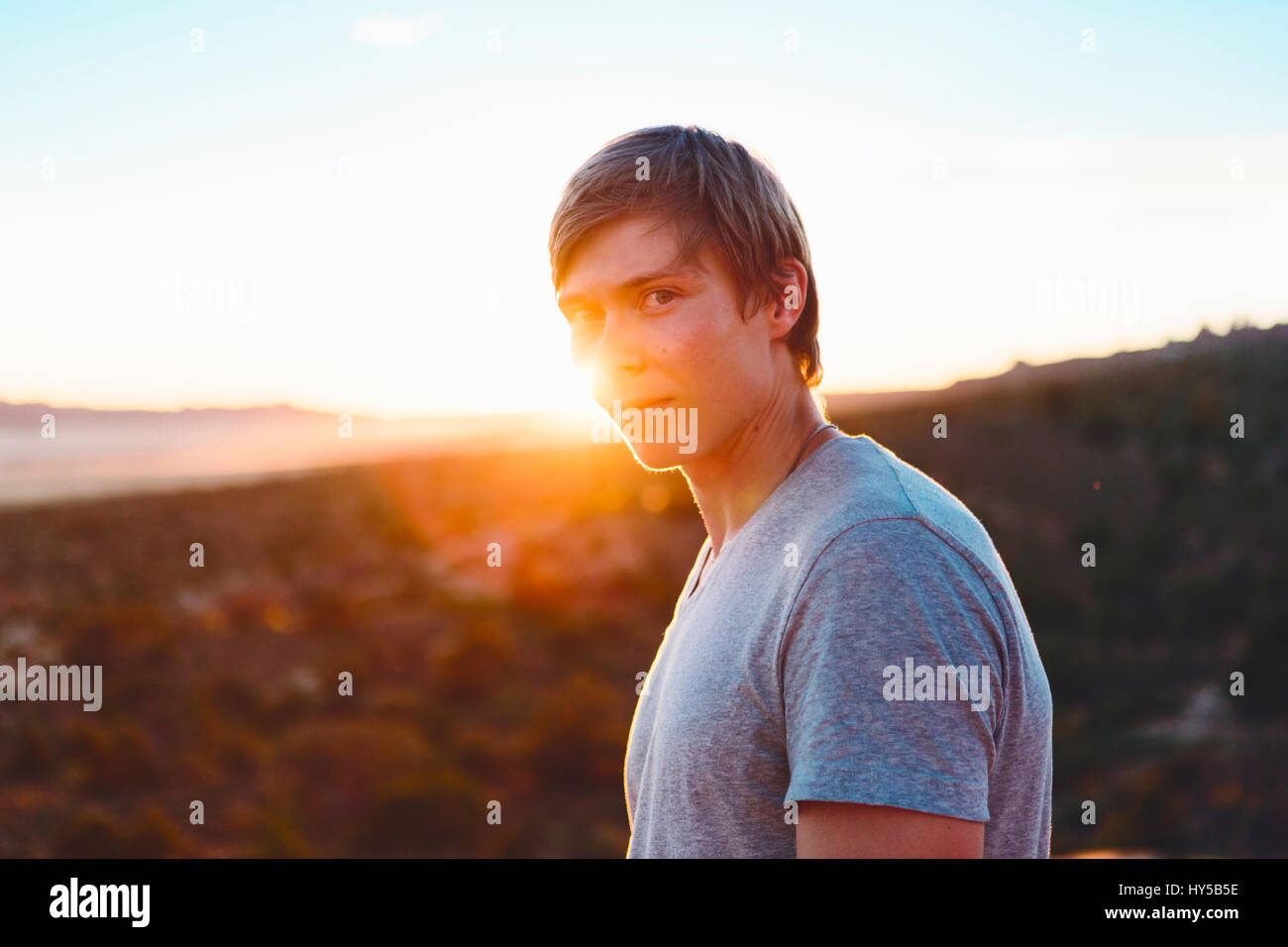 Man standing in the sun hi-res stock photography and images - Alamy