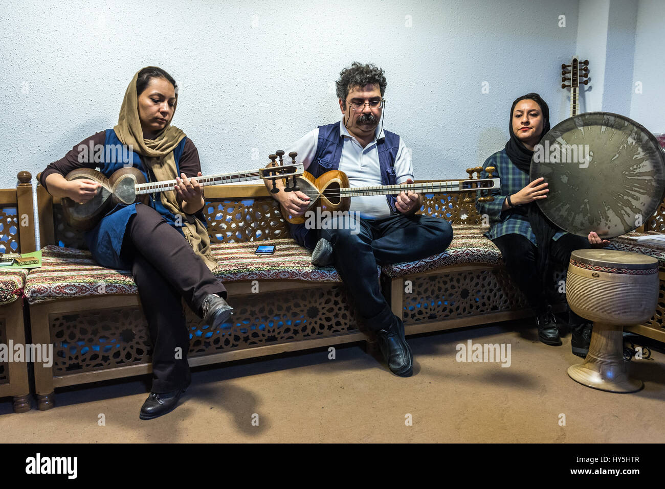 Iranians playing on traditional instruments during concert for tourist ...