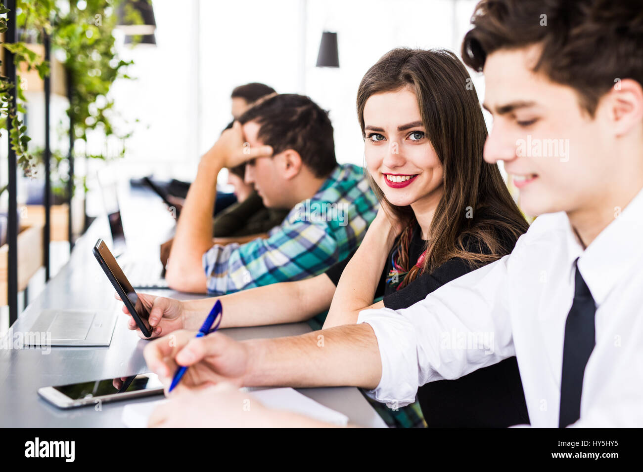 Group of Business People Using Digital Devices Stock Photo - Alamy