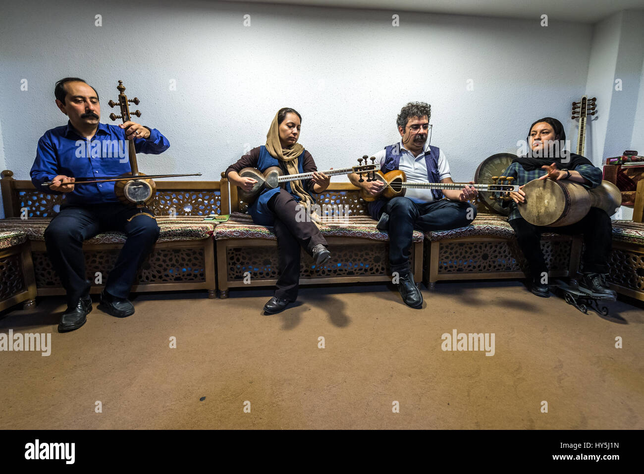Iranians playing on traditional instruments during concert for tourist ...