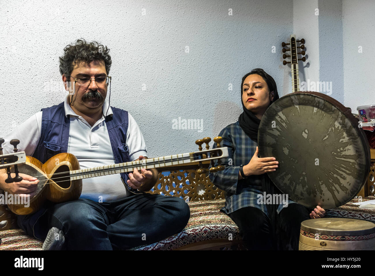Iranians playing on traditional instruments during concert for tourist ...