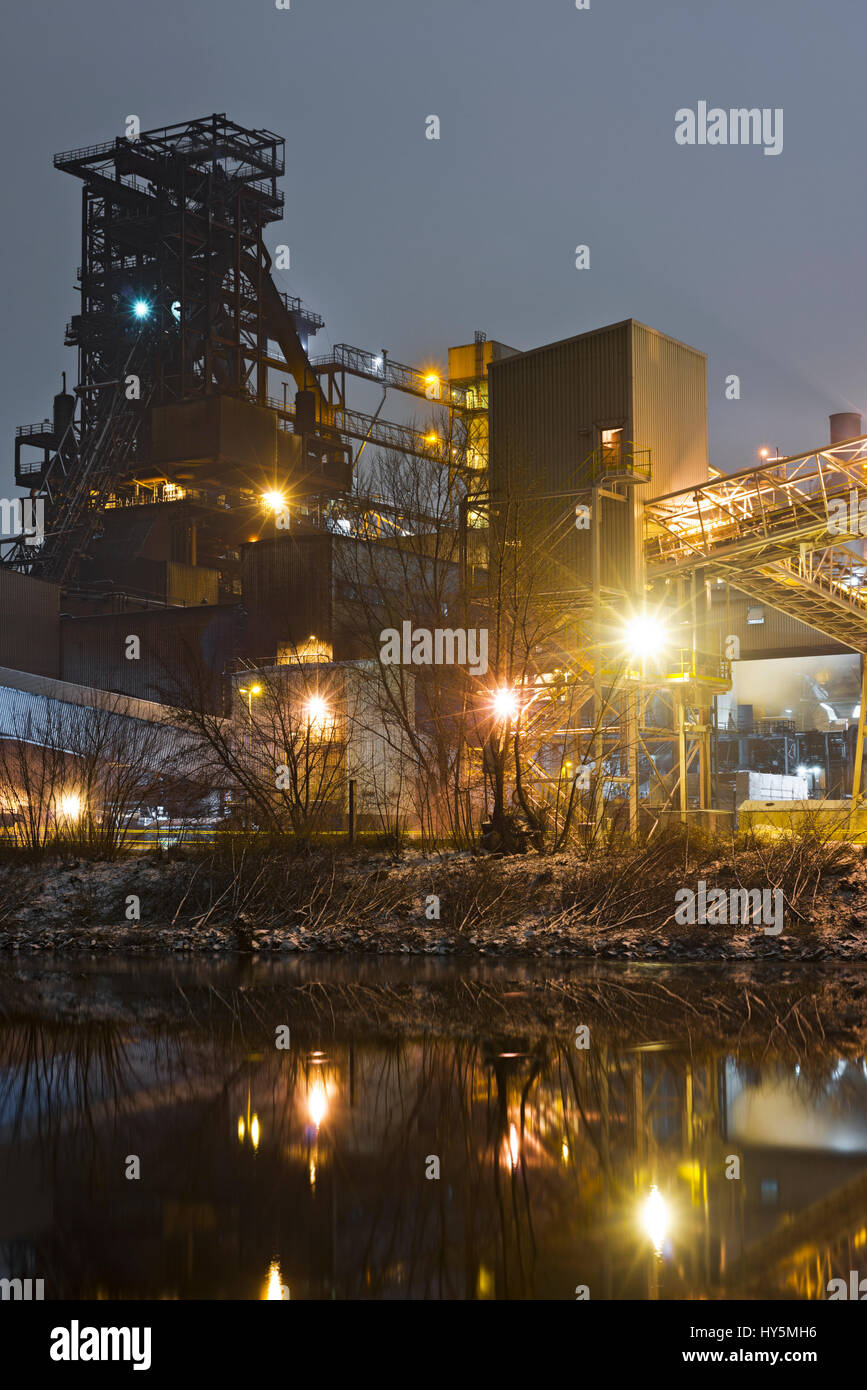 Blast furnace at a steel plant at night Stock Photo - Alamy