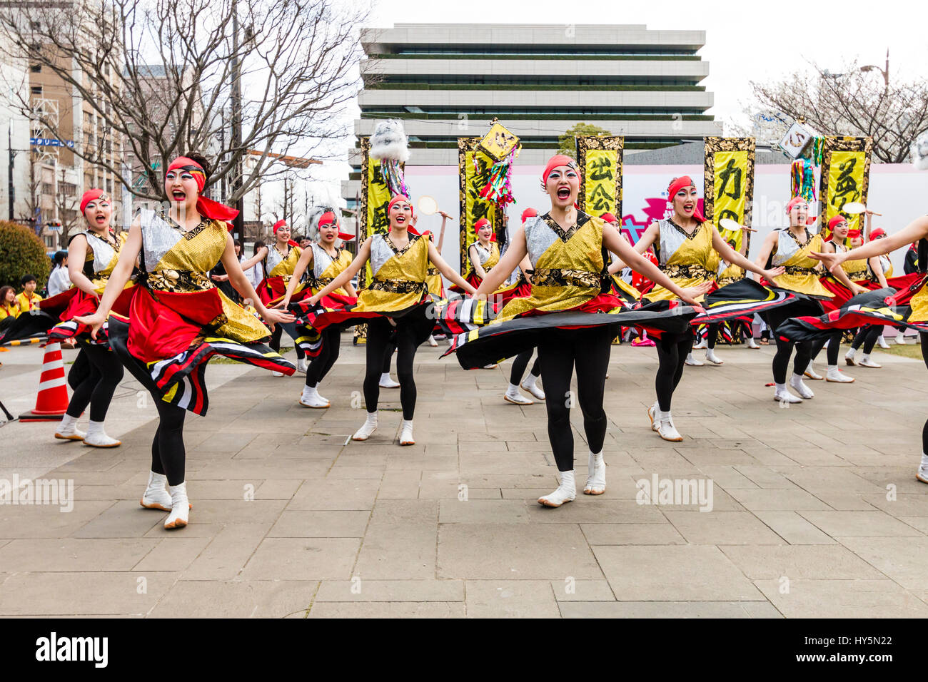 Yosakoi dance festival. Team of young women dancers, dancing and ...
