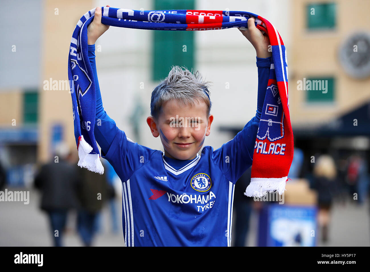 A young Chelsea fan arriving for the Premier League match at Stamford ...