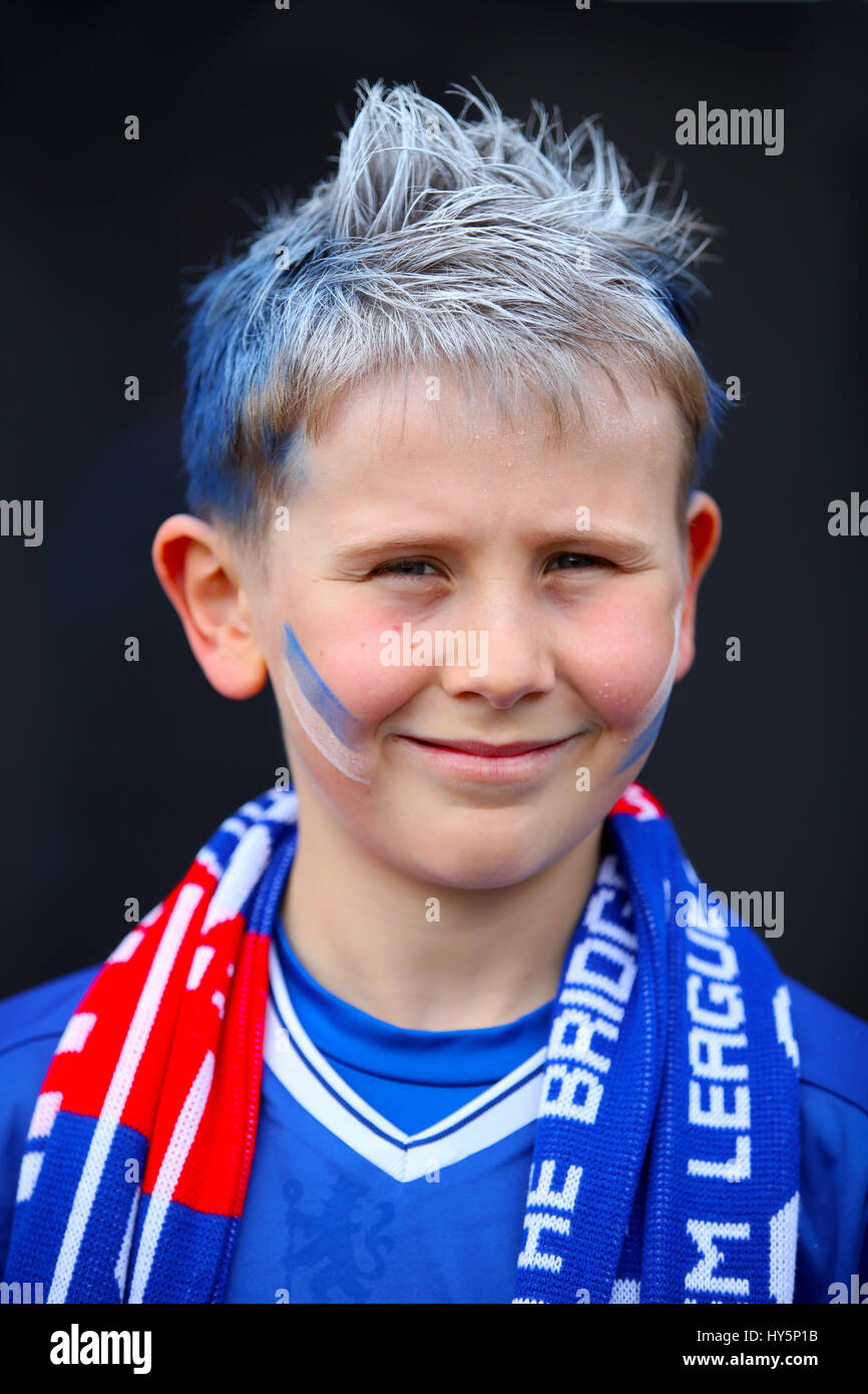 A young Chelsea fan arriving for the Premier League match at Stamford ...