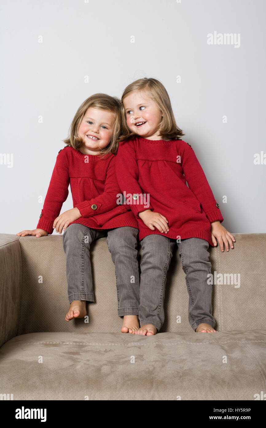 Funny identical twins sisters hi-res stock photography and images - Alamy