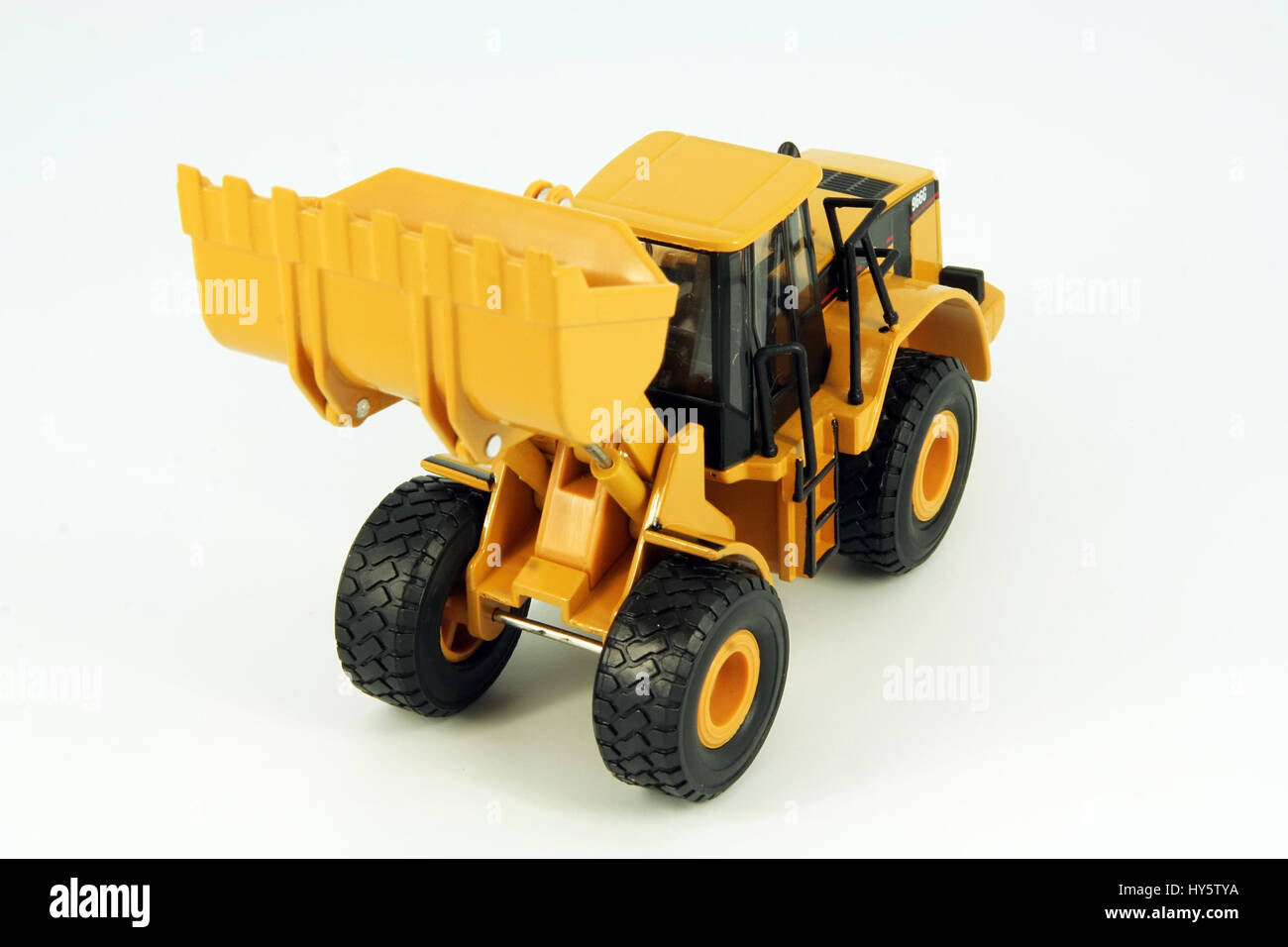 Bulldozer toy. Dredge toy Stock Photo - Alamy