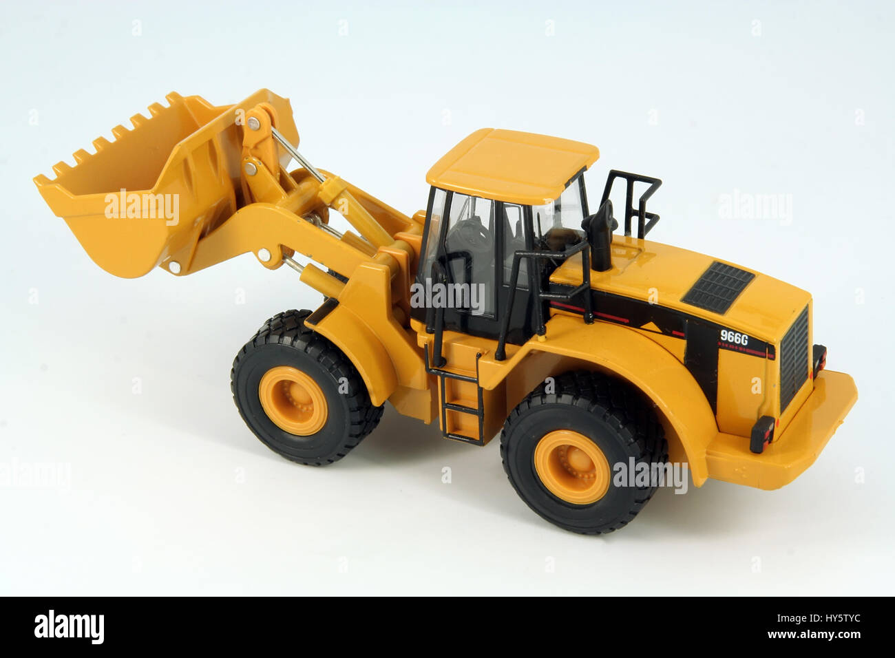Bulldozer toy. Dredge toy Stock Photo - Alamy