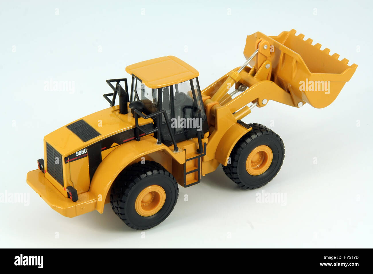Bulldozer toy. Dredge toy Stock Photo - Alamy