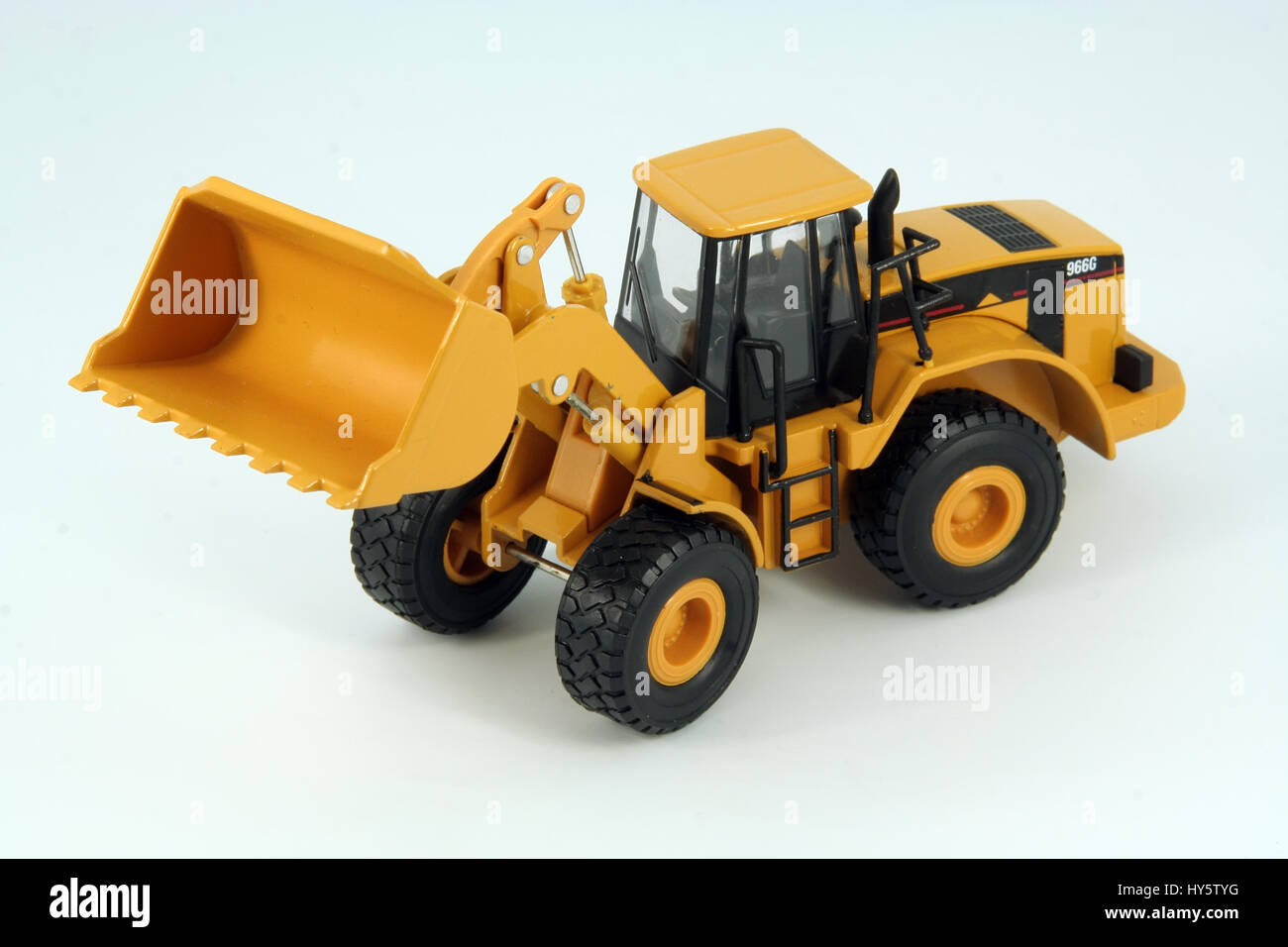 Bulldozer toy. Dredge toy Stock Photo - Alamy