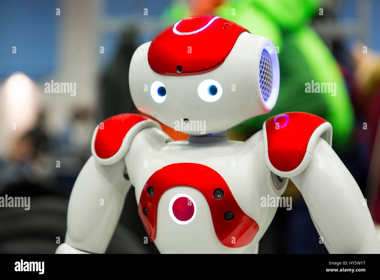 Programmable robot for education. Electronic white and red robot which ...