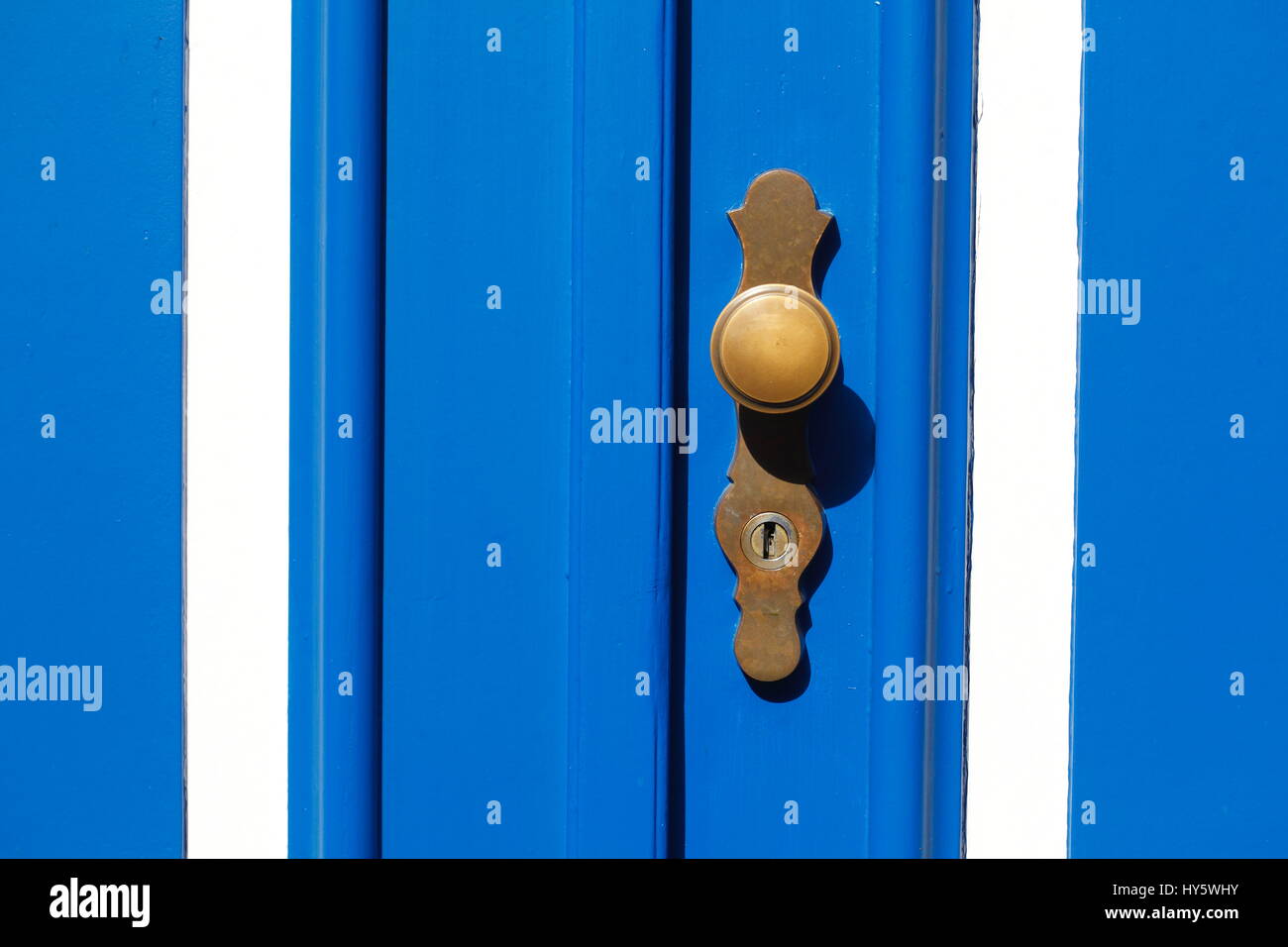 blue wooden door with metal lock Stock Photo - Alamy