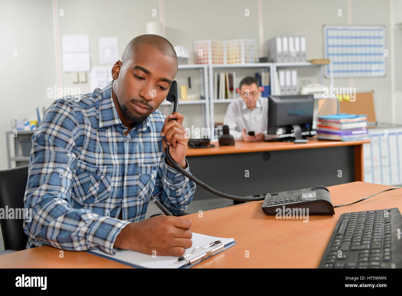 Taking over computer desk hi-res stock photography and images - Alamy