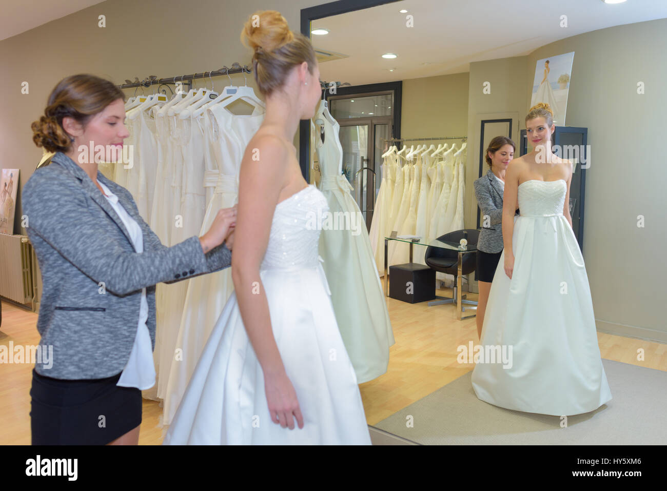 Wedding dress fitting hi-res stock photography and images - Alamy