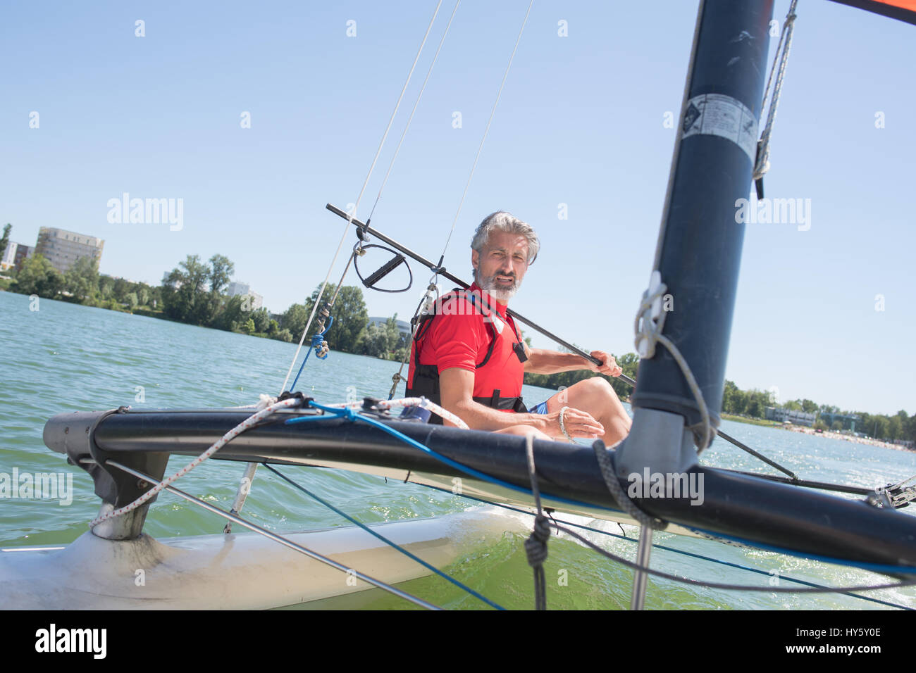 enjoying extreme sailing with racing sailboat Stock Photo - Alamy